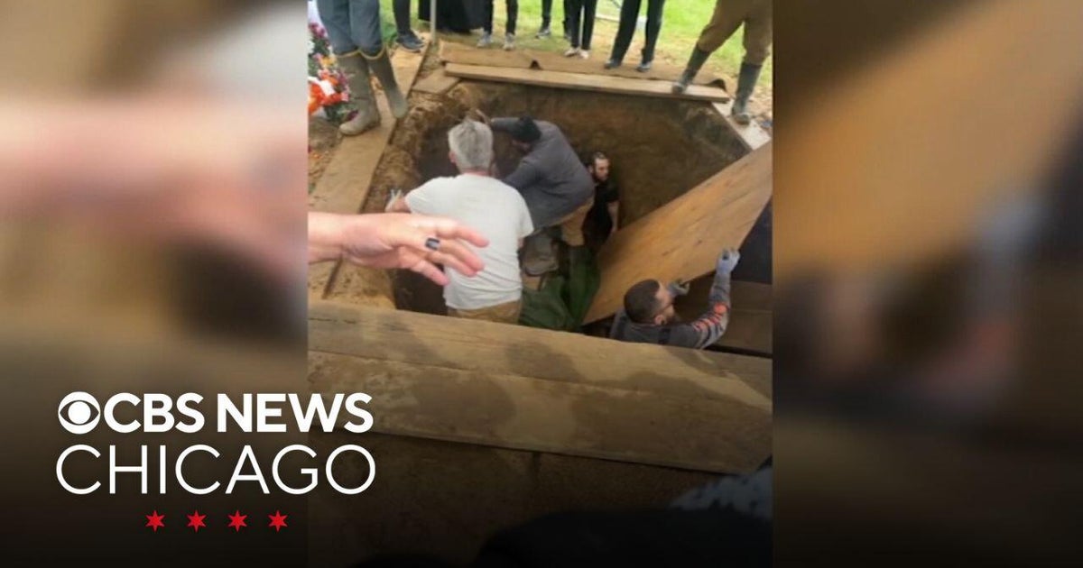 Pallbearers fall into open grave during Philadelphia funeral - CBS Chicago