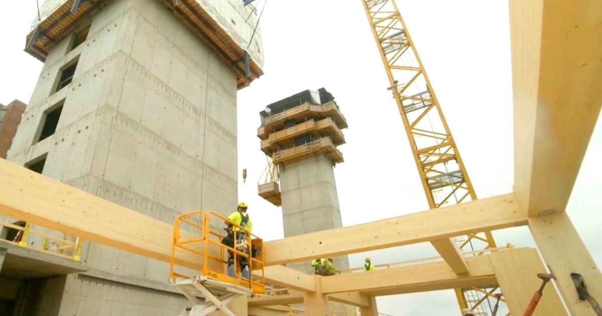 Why urban builders are switching to mass timber - CBS News
