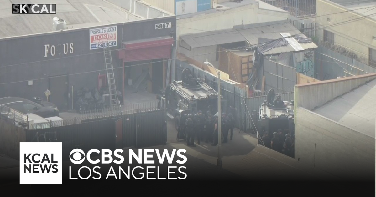 LAPD SWAT in standoff with armed suspect at South LA warehouse - CBS ...