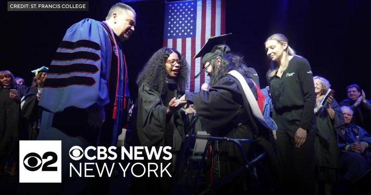 St. Francis College student with cerebral palsy walks across graduation ...