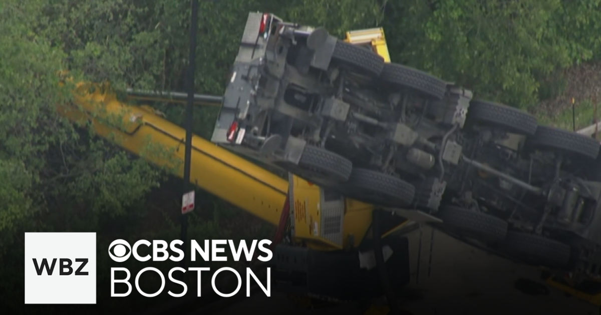 Crane tips over in Weymouth - CBS Boston