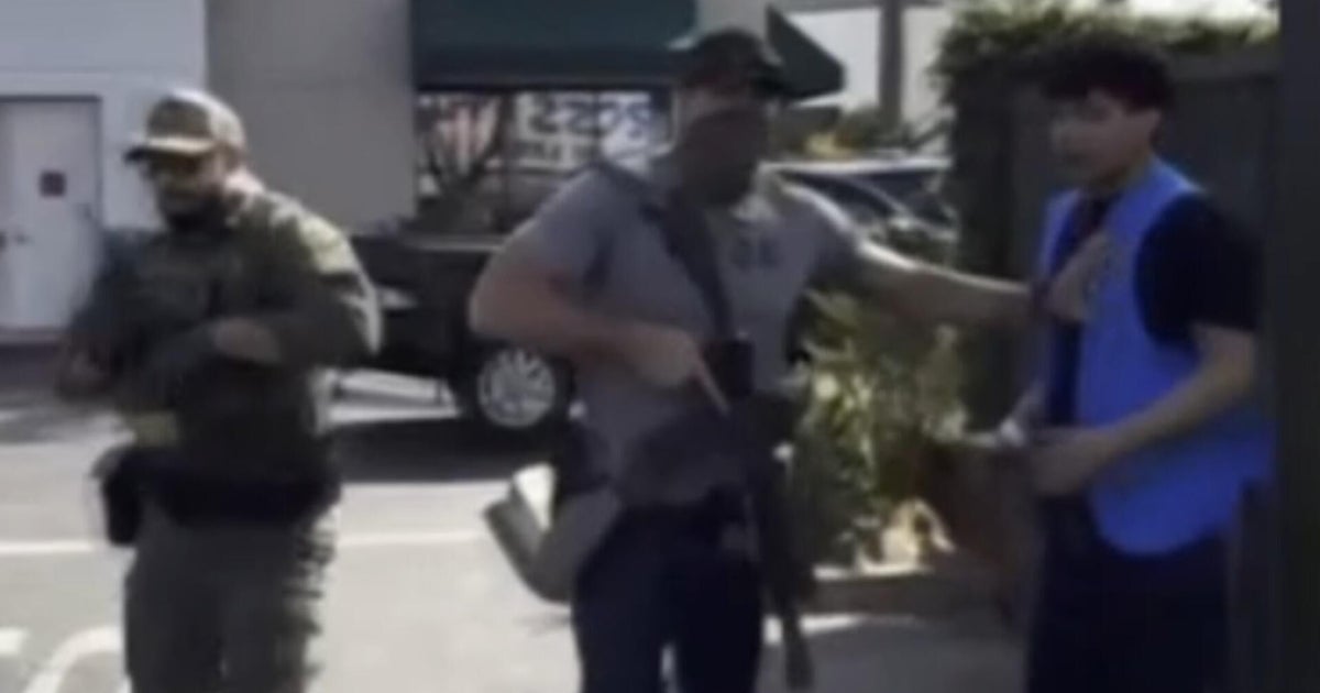 Video shows ICE detaining 20-year-old U.S. citizen outside Walmart ...