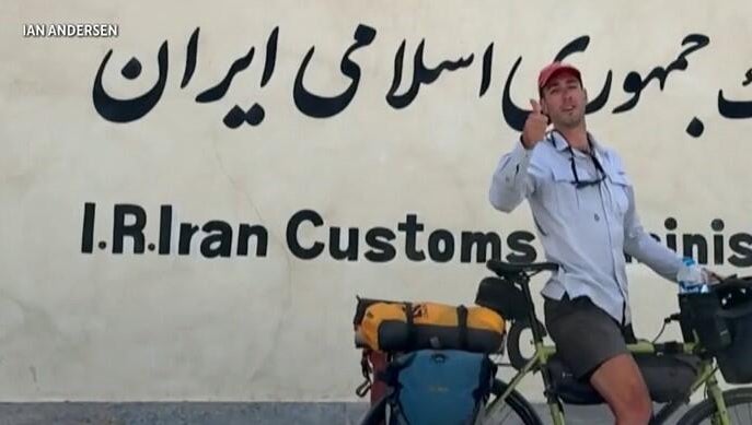 American cyclist who got trapped in Iran talks about his tense escape as Israeli "bombs kept ...