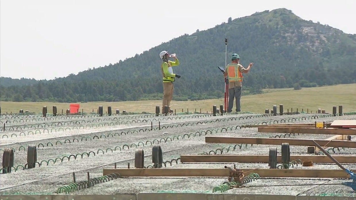 Colorado construction crews build wildlife overpass over I-25 in ...