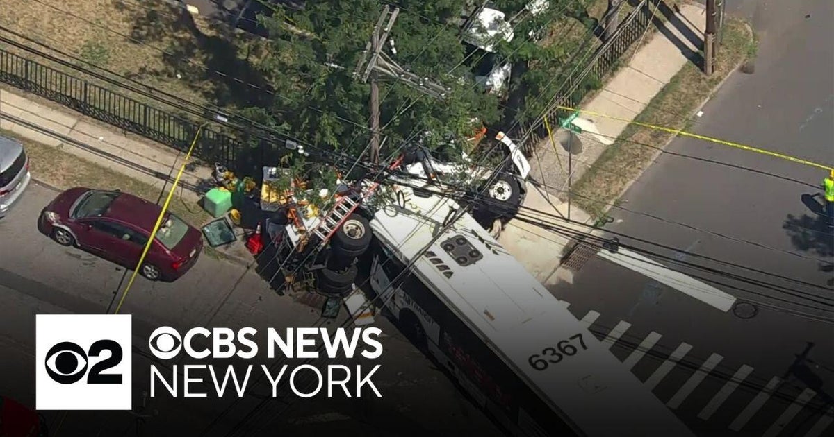 NJ Transit bus hits PSEG truck in Newark - CBS New York