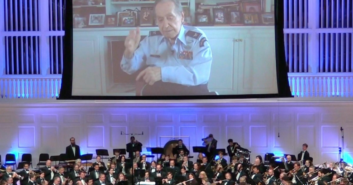 WWII veteran fulfills vow to conduct band on 100th birthday - CBS News