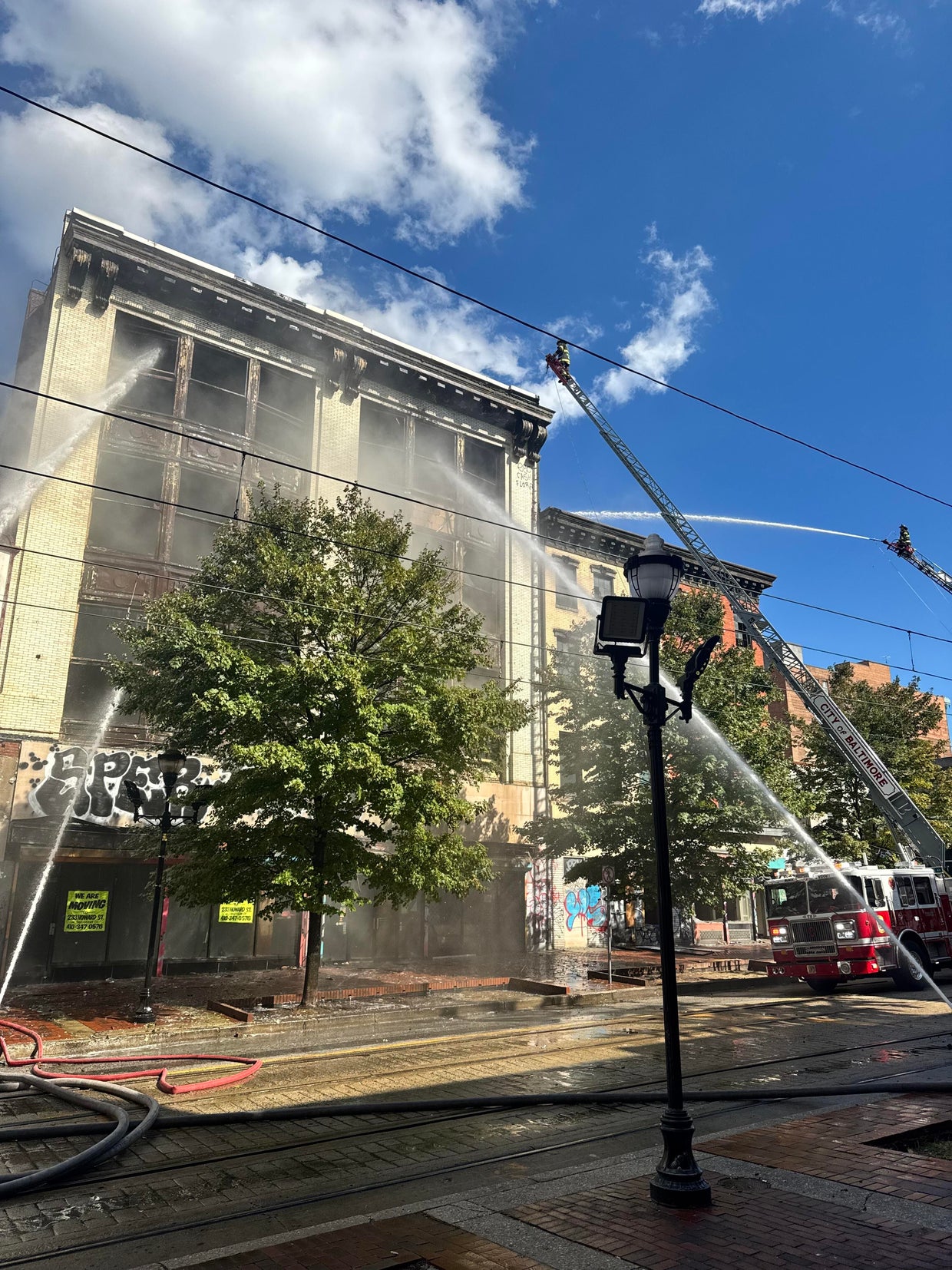 Fire that spread across three vacant buildings in Downtown Baltimore ...