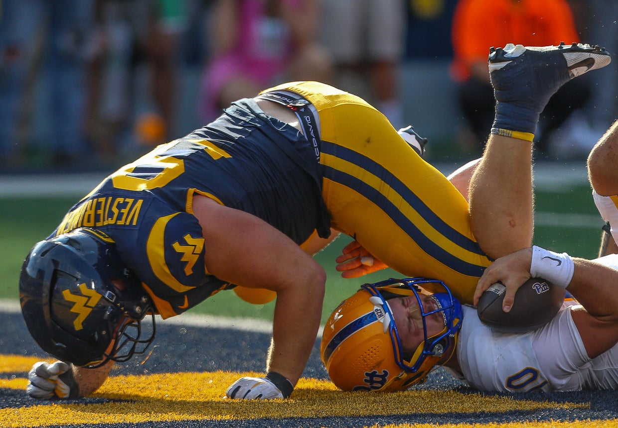 PHOTOS: West Virginia completes comeback, beats Pitt in overtime to win ...