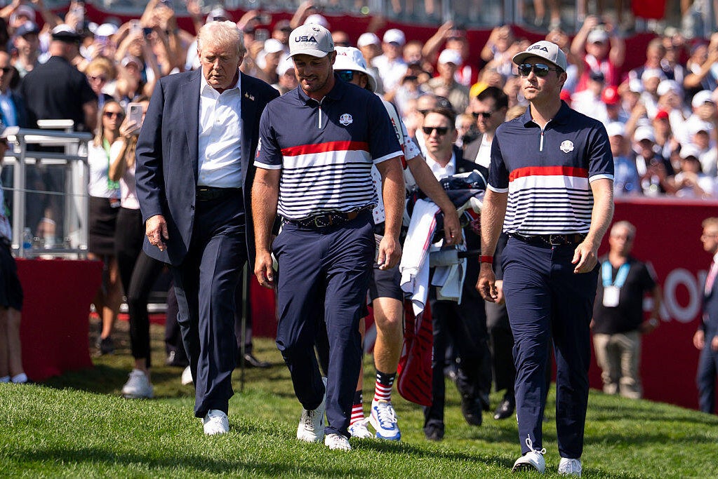 Trump attends Ryder Cup to boost U.S. team on first day of matches with ...