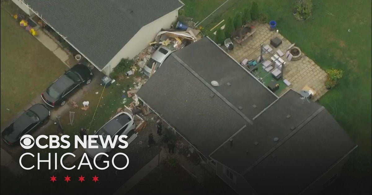 2 hurt when car crashes into Hanover Park home - CBS Chicago