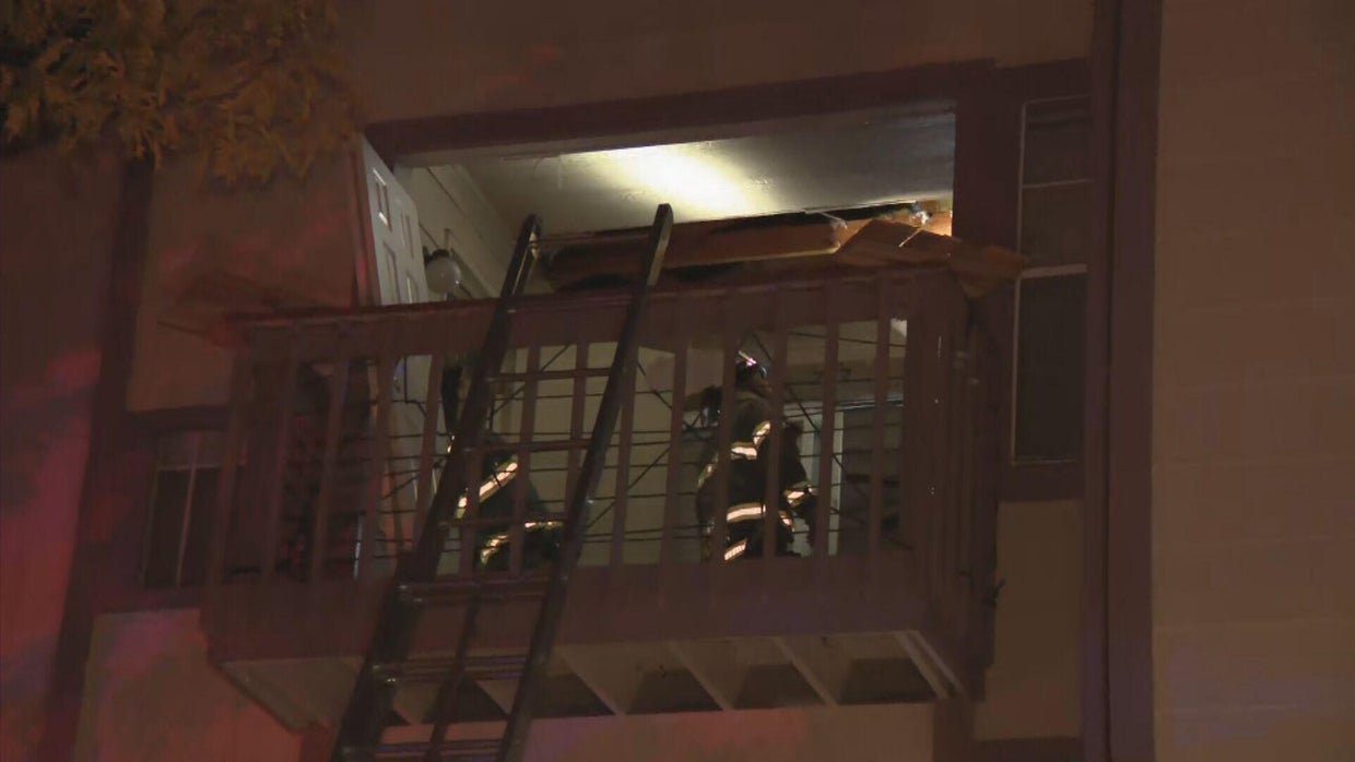 Denver firefighters rush to burning apartment before dawn Friday - CBS ...
