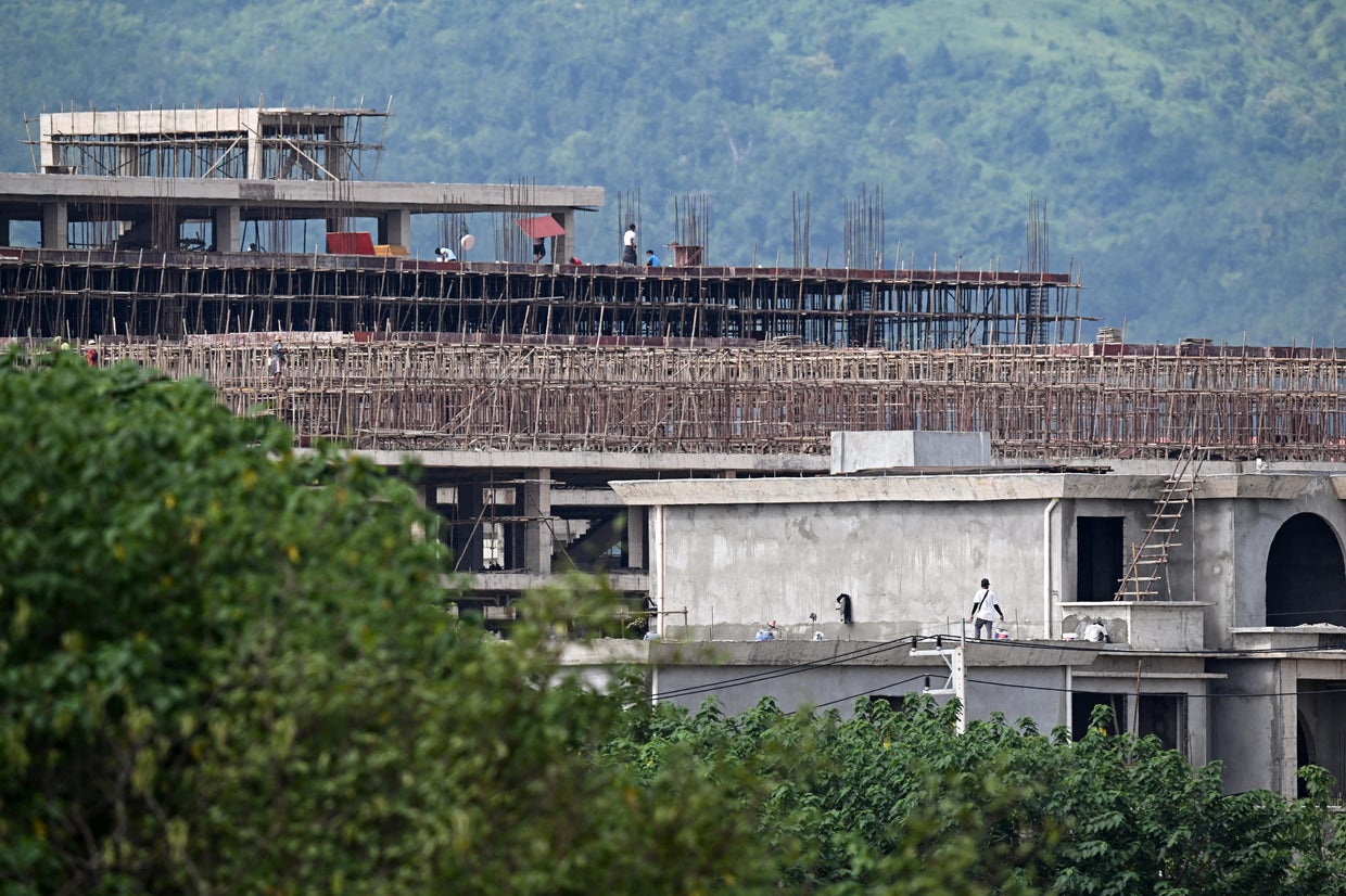 China sentences 5 to death for building, running criminal gang fraud ...