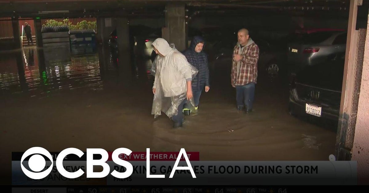 Rain floods underground parking lot in Palms - CBS Los Angeles