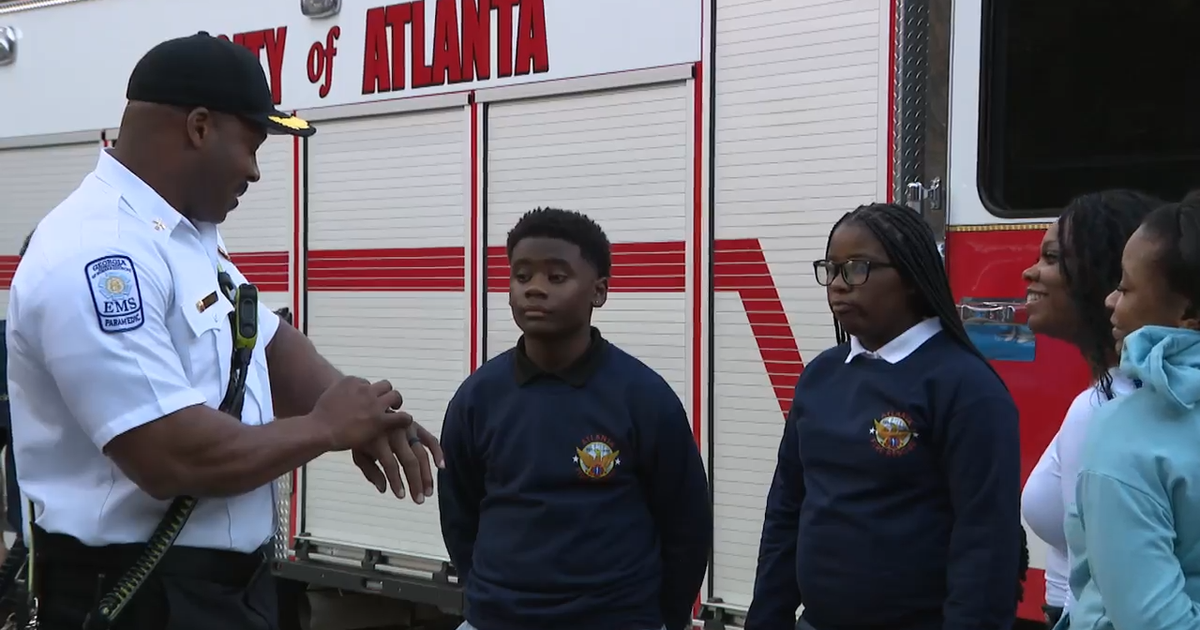 Atlanta firefighters rescue two children trapped 75 feet inside ...