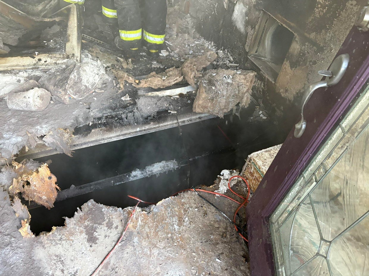 Denver firefighter rescued after falling through the floor during house ...