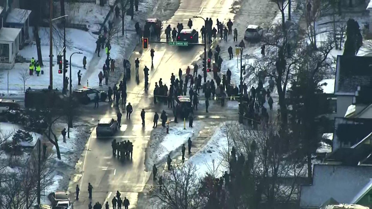 Law enforcement, protesters clash in south Minneapolis after ICE shooting