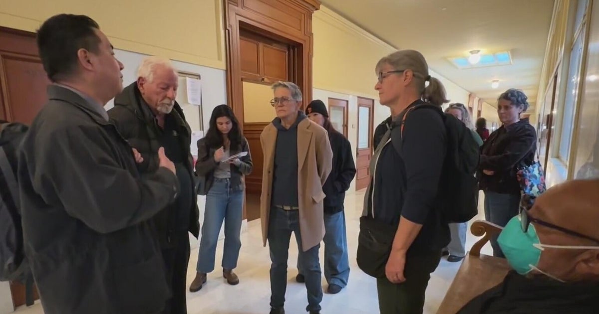 Retired firefighters confront insurance company rep over denial of ...