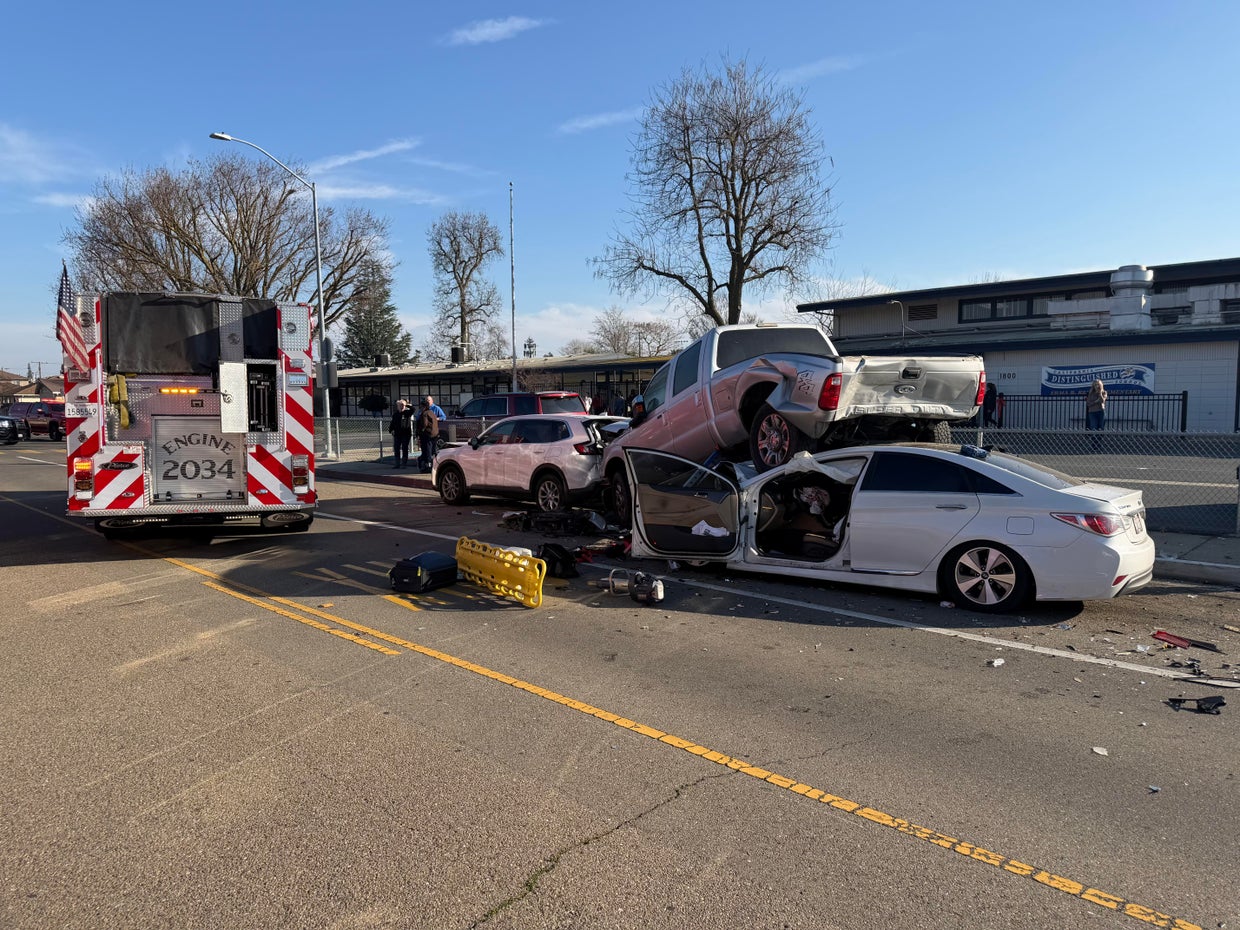 Adult, child injured after car slams into parked vehicles in front of ...