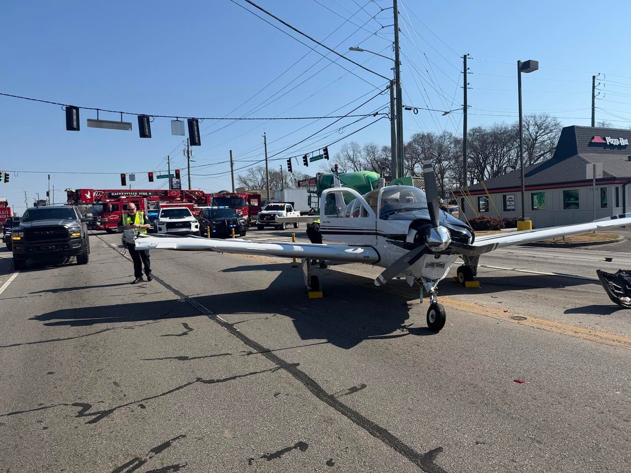 Small plane crashes into vehicles during emergency landing in ...