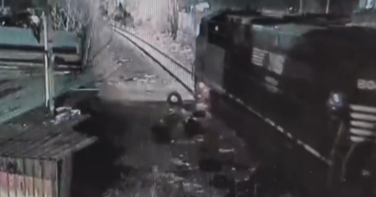 Video shows freight train plow through illegally dumped tires on North ...