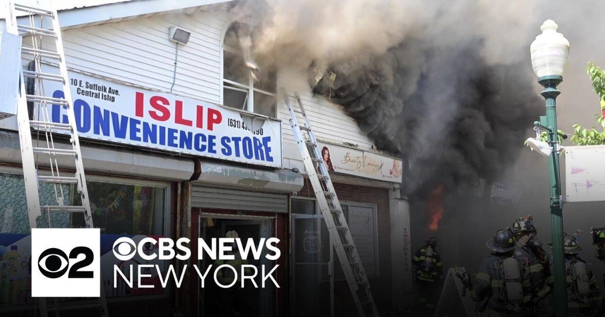Firefighter, police officer hurt in Long Island strip mall fire - CBS ...